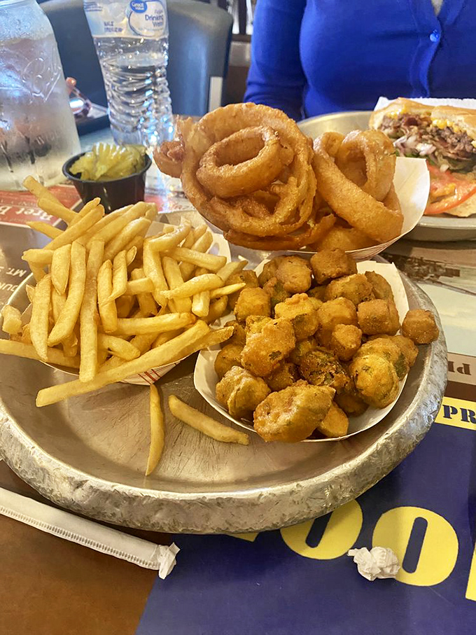 A holy trinity of sides: fries, onion rings, and fried okra. Carb-counters, avert your eyes!