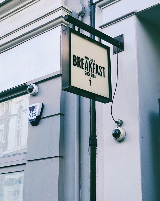 Taking care of breakfast business since 2005! This sign is like a beacon of hope for hungry souls, promising delicious things to come.