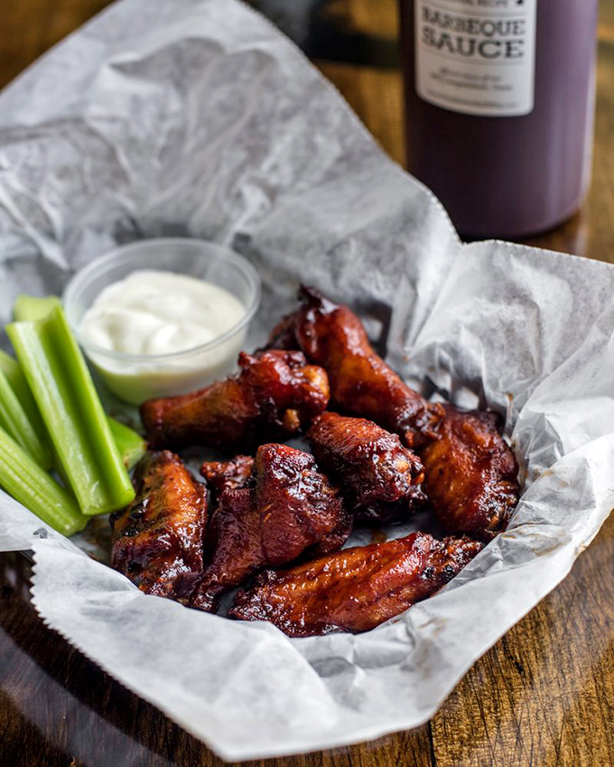 Wings that put Buffalo on notice. That blue cheese dip isn't just a condiment&mdash;it's the perfect creamy counterpoint to smoky-sweet heat.