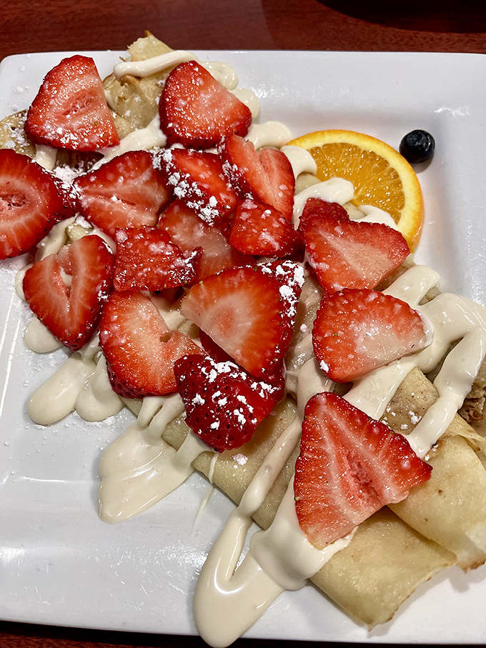 Berry bliss on a plate! These strawberry crepes are so pretty, they could double as modern art. Eat them before the MoMA claims them!