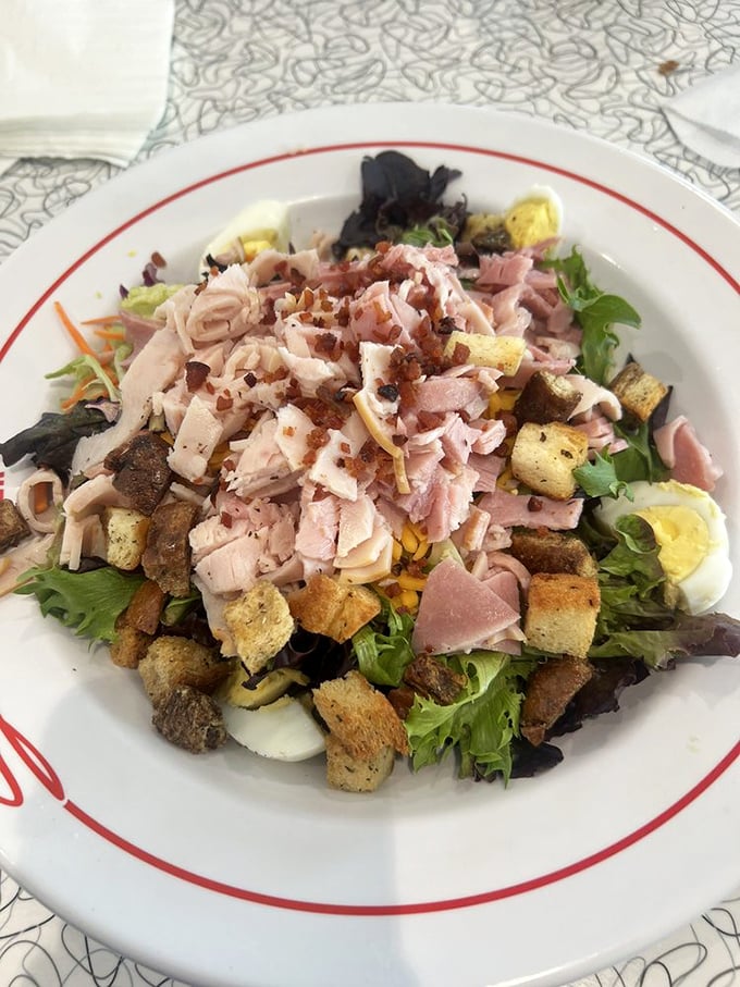 A salad that actually excites! This chef's creation proves that sometimes, the healthier choice can be the most satisfying. Who knew?