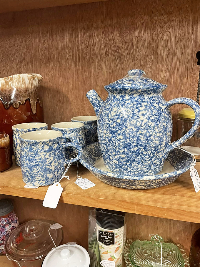 A blue speckled teapot set that makes even microwaved water taste like it came from a proper English garden party.