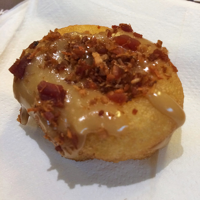The Bacon Sunrise: Where breakfast meets paradise on a donut. It's like a luau for your mouth!