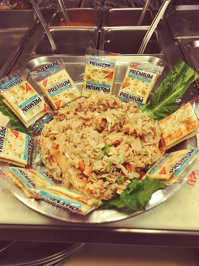 Tuna salad gets a glow-up! Surrounded by crackers like a fishy celebrity, this dish is ready for its close-up. Lunch just got an upgrade.