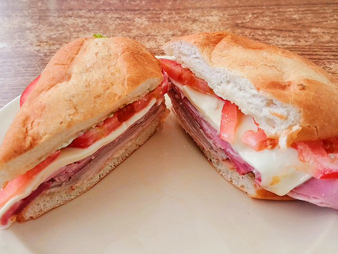 A sandwich that's more stacked than a deck of cards. Layer upon layer of deli deliciousness between two pillowy slices of heaven.