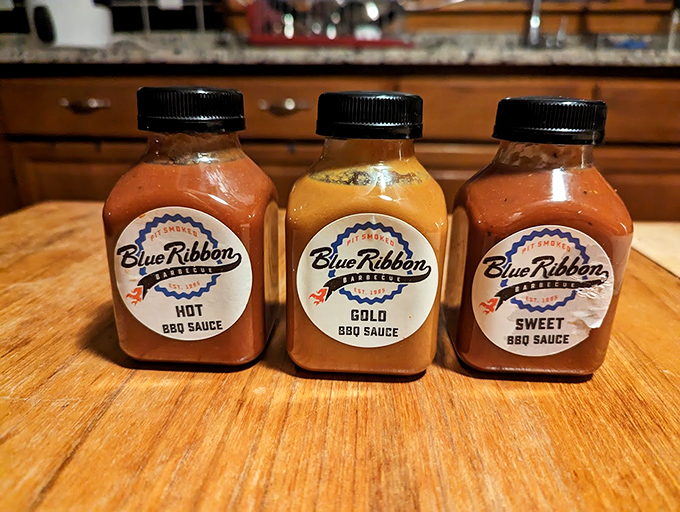 The holy trinity of barbecue sauces: Hot, Gold, and Sweet. Choose your weapon wisely &ndash; or better yet, try all three!