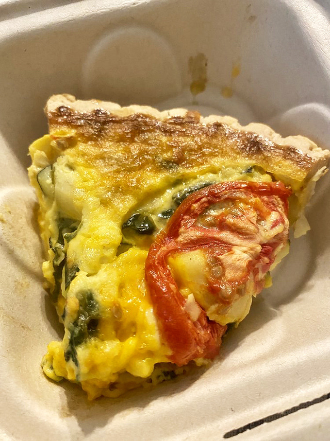 Who said donuts can't be nutritious? This veggie quiche is sneaking some green into your morning routine. It's like a garden party in a pastry shell!