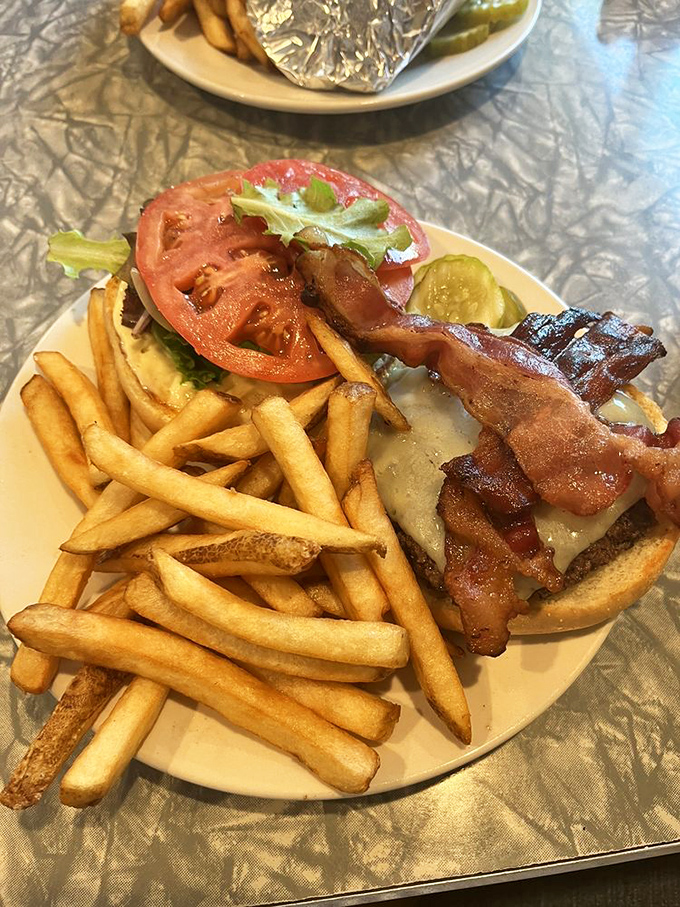 Meet the Vermont cheeseburger: where cow meets cow in a bun-hugging embrace that'll make you say "Moooore, please!"