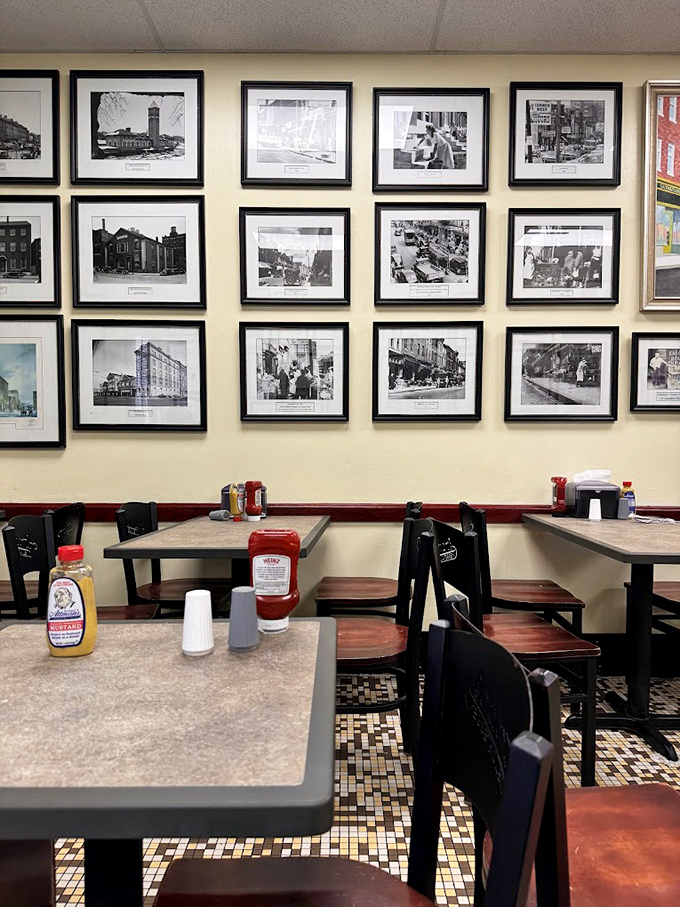 These aren't just photographs&mdash;they're chapters in Baltimore's culinary history book, watching over diners who continue the tradition of breaking bread together.