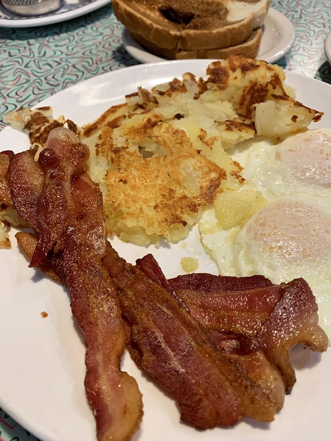 Bacon, eggs, and hash browns&mdash;the holy trinity of breakfast done right. When the bacon has that perfect crisp-yet-chewy texture, you know you've found breakfast nirvana.