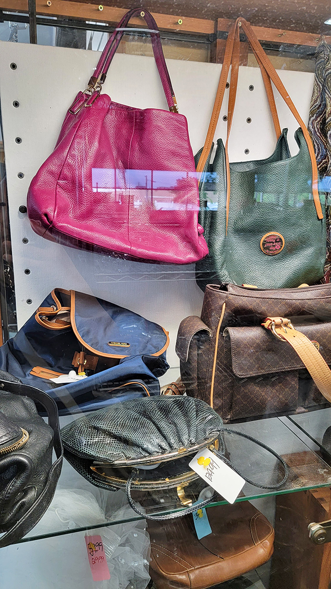 Designer bags without designer prices! That fuchsia leather tote probably cost someone hundreds, but here it's waiting to become your favorite bargain brag.