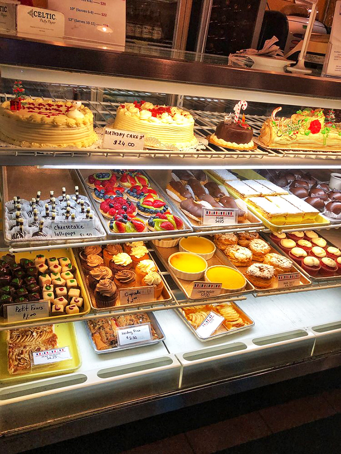 A dessert case that's basically Willy Wonka's factory, but French. Resistance is futile, but oh so delicious.