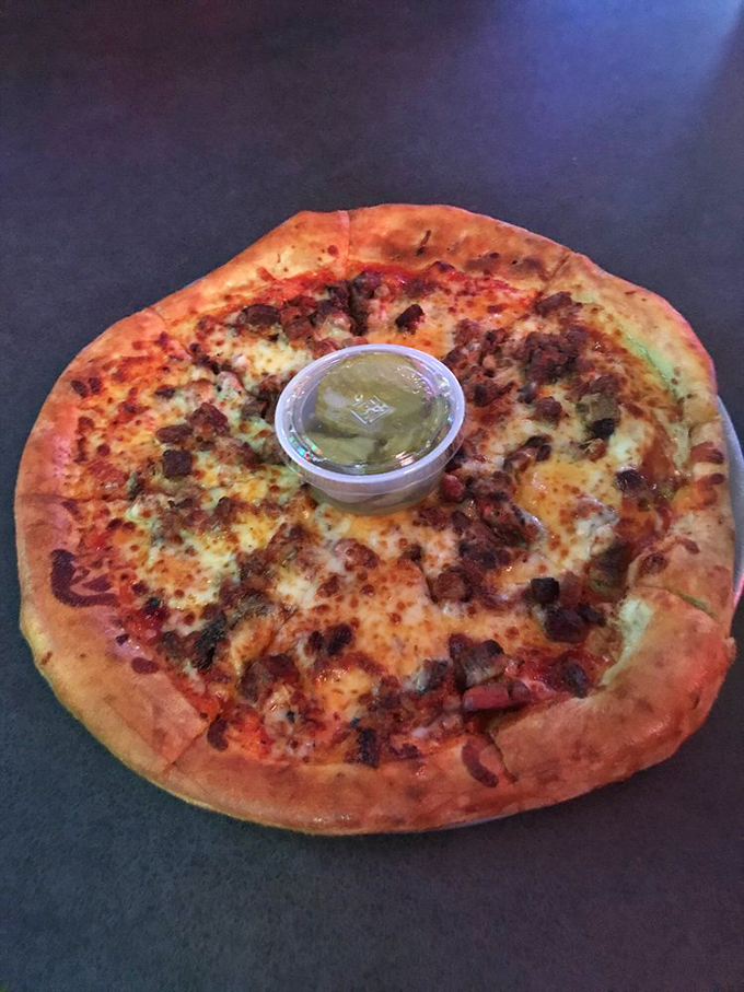 BBQ meets pizza in a flavor explosion! This brisket-topped wonder is like a rodeo for your taste buds.