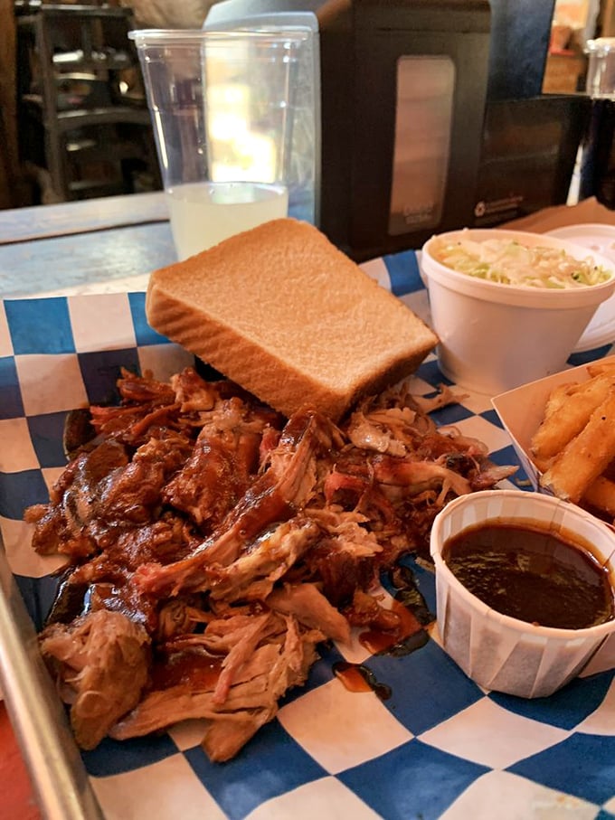 Behold, the star of the show! This pulled pork is so tender and juicy, it might just pull your heart strings along with your fork.