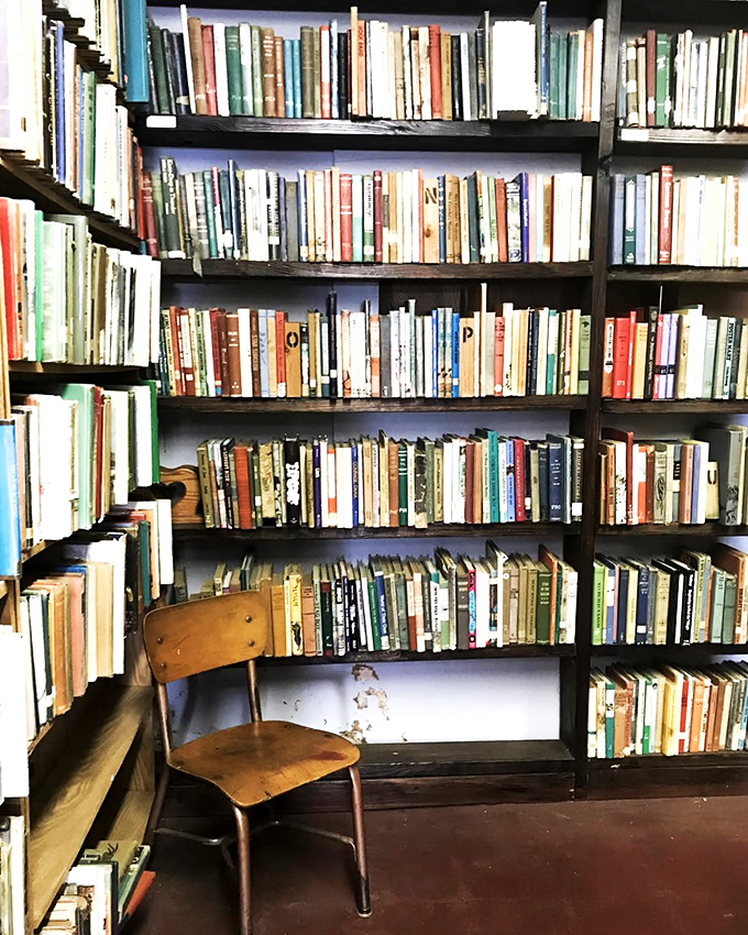 From floor to ceiling, a tapestry of tales awaits. It's like "Jenga" for bookworms - careful which one you pull!