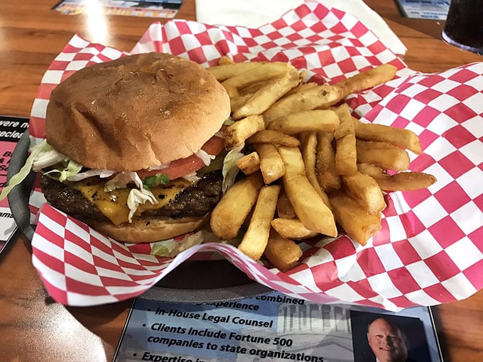 Burger and fries: the dynamic duo of comfort food. This plate is like a warm hug for your stomach.
