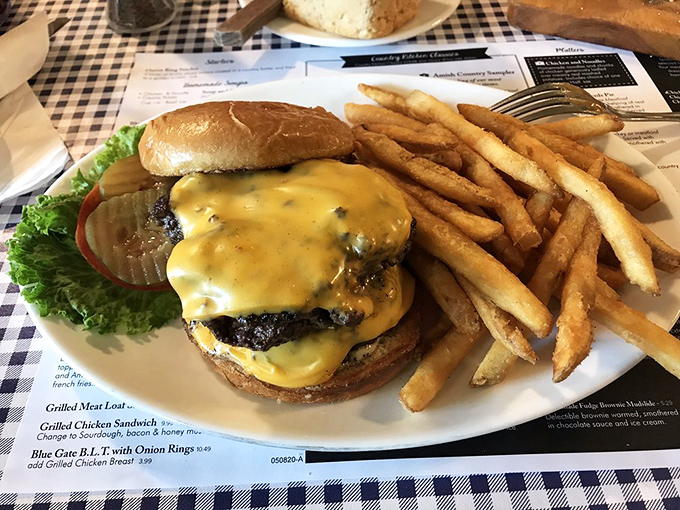 Behold the burger that launched a thousand road trips. This cheesy masterpiece proves that sometimes, perfection comes on a bun.