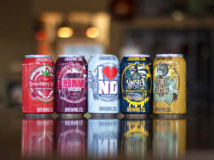 A rainbow of flavors in aluminum! These colorful cans are like a portable party, each one promising a unique taste adventure.
