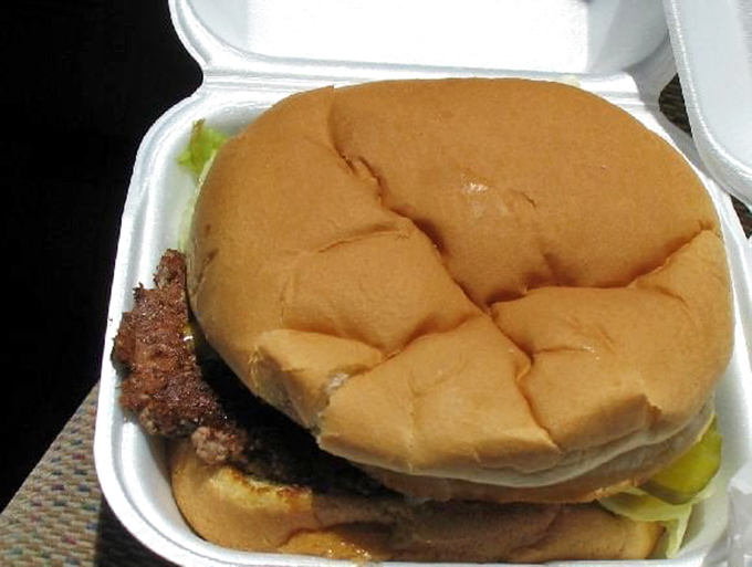 Behold, the cheeseburger of champions! This beauty could make even the Mona Lisa crack a smile.