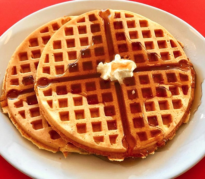 Waffle perfection, served with a side of nostalgia! These golden beauties are like edible sunshine, ready to brighten your day one syrupy bite at a time.