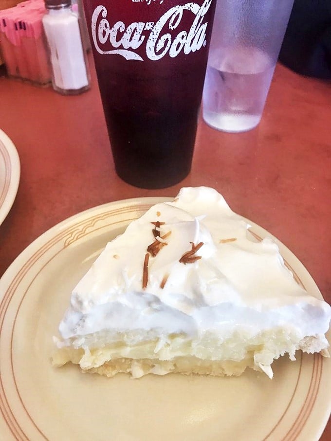 Cloud nine, served on a plate. This coconut cream pie is so fluffy, it might float away if not for that sturdy crust anchor.
