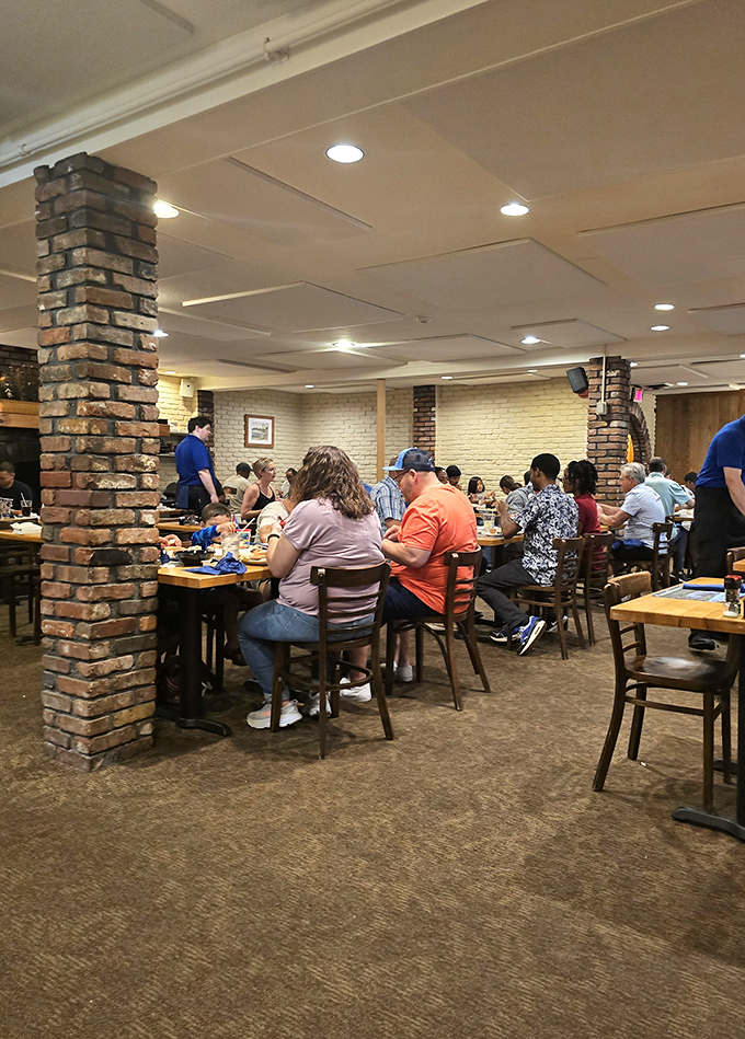 A room full of happy diners, all united in the universal language of "Mmm!" It's like a United Nations of seafood lovers!