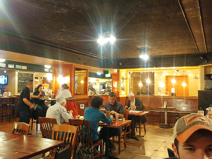 "Happy faces, full bellies!" The scene of contented diners savoring their meals is proof that at Boney's, barbecue isn't just food - it's a full-contact sport for your taste buds.