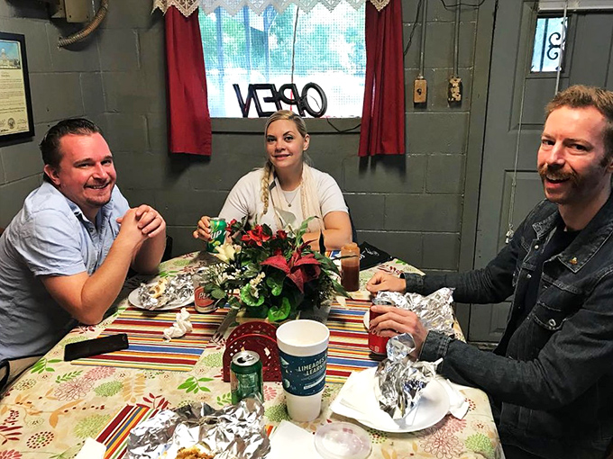 The image shows diners enjoying a meal at Jones Bar-B-Q Diner.