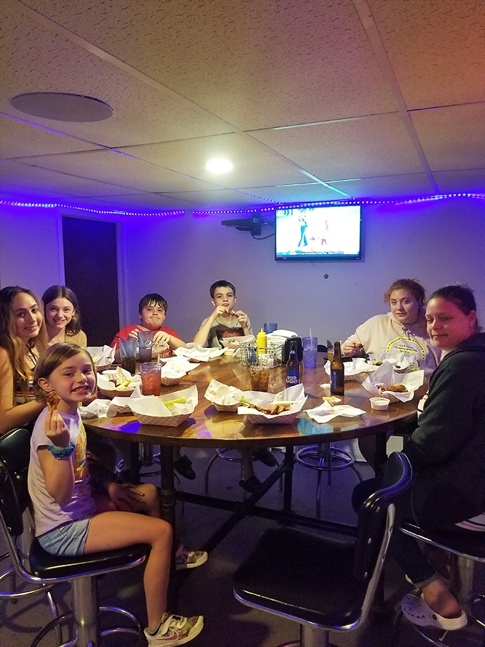 A family feast in progress. More smiles than a toothpaste commercial, and twice as genuine.