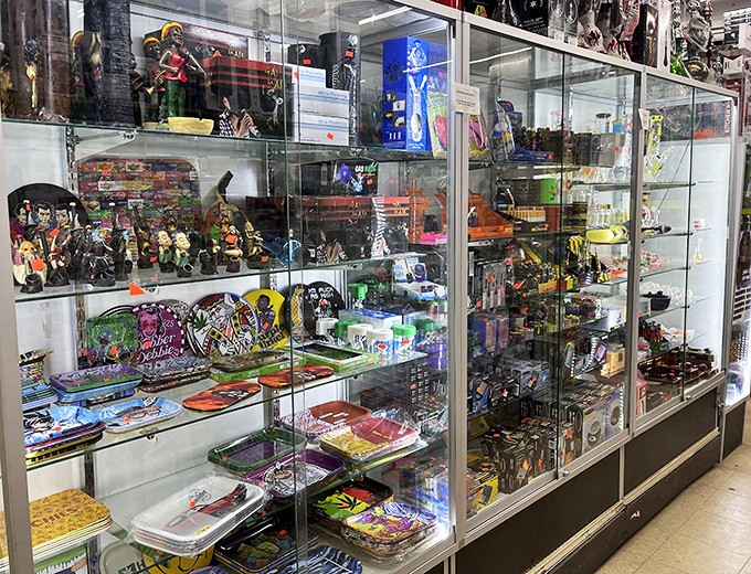 Curio cabinet of curiosities! This display case is a miniature museum of knick-knacks, where action figures and novelty items live in harmony.