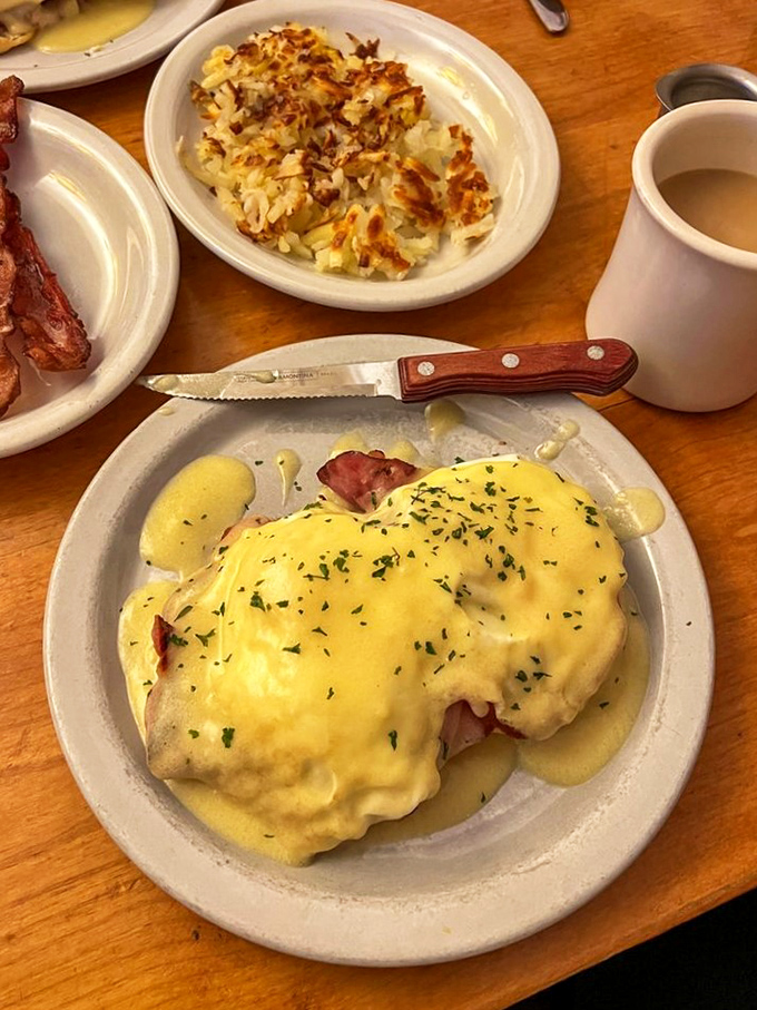 Eggs Benedict, you beautiful golden goddess! This plate is proof that sometimes the best things in life are smothered in hollandaise sauce.