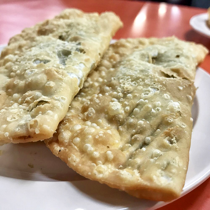 Golden-fried empanadas: crispy on the outside, a flavor explosion on the inside. It's like a hug for your taste buds, wrapped in a flaky embrace.