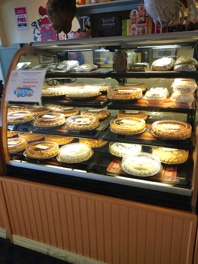 Pie paradise alert! This display case is where diets come to die and happiness is served by the slice.