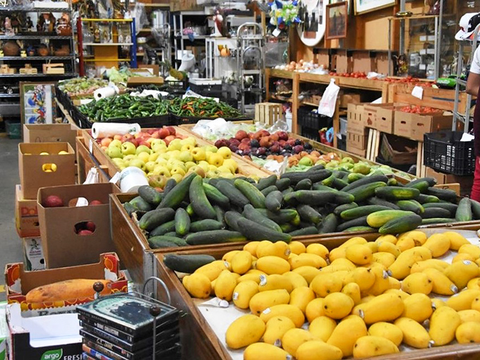 Fresh produce meets flea market frenzy! It's a farmers' market with a twist, where you can buy a bushel of apples and a vintage apple peeler in one fell swoop.