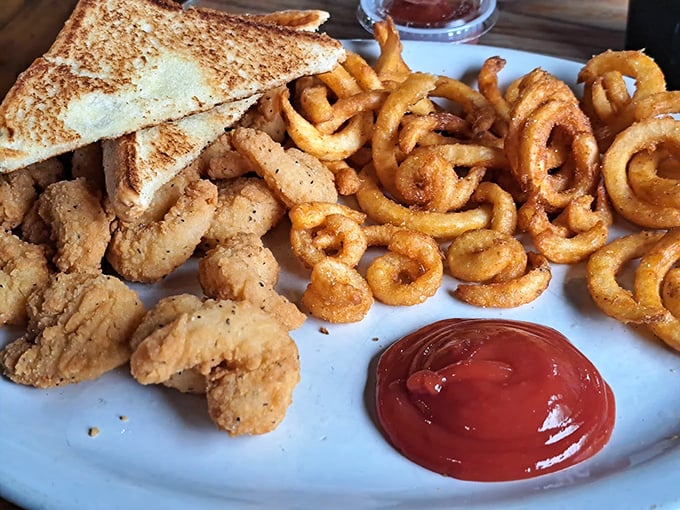 The holy trinity of Southern comfort: golden-fried shrimp, crispy fries, and Texas toast. Add some coleslaw and beans for a plate of pure joy.