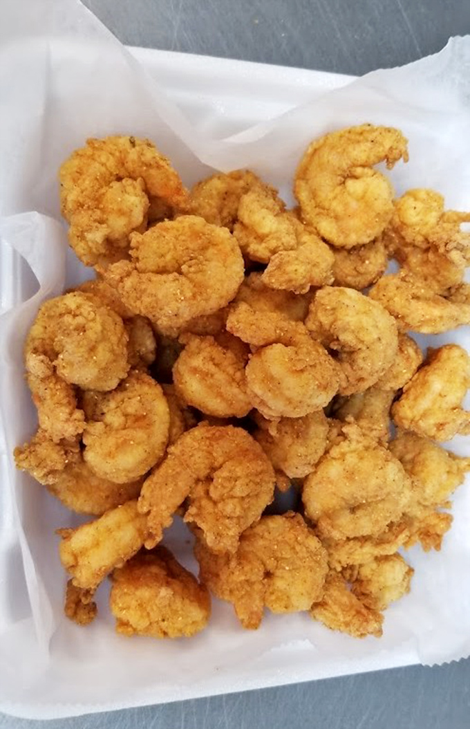 Golden-fried shrimp that would make Forrest Gump proud. These crispy crustaceans are like little life rafts in a sea of deliciousness.