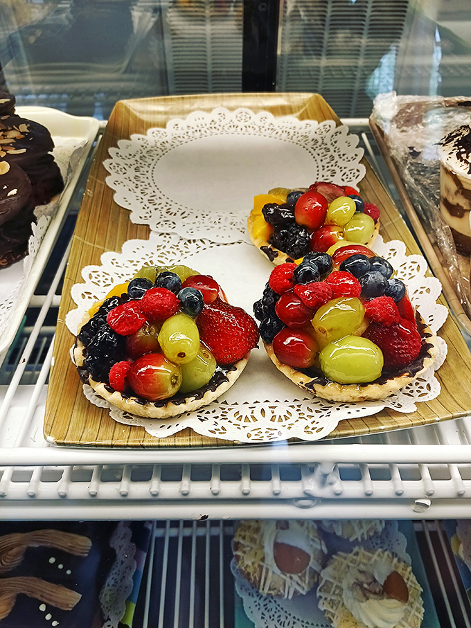 A fruit tart so vibrant, it could double as a color swatch for your next home makeover. Delicious and decorative!