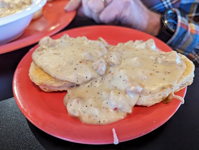 Gravy train coming through! These biscuits are swimming in a pool of creamy, peppery perfection. Napkins advised, but totally worth it.