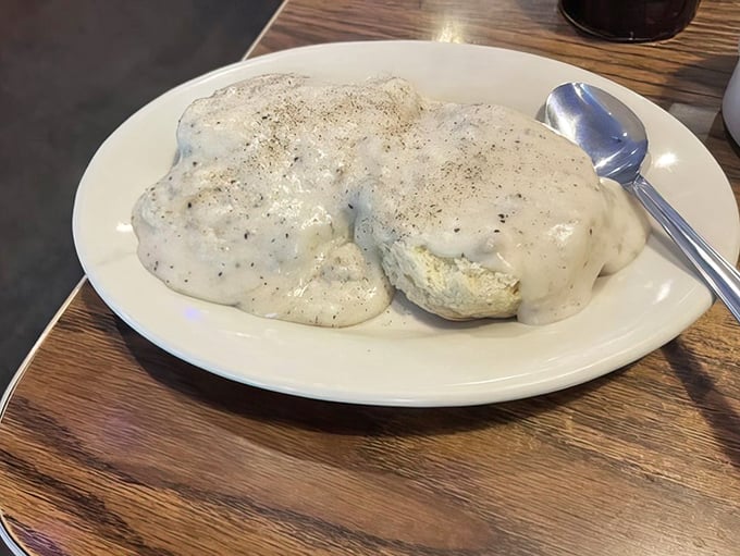 Biscuits drowning happily in a sea of creamy, peppery gravy. It's not just breakfast; it's a warm, comforting hug for your taste buds.