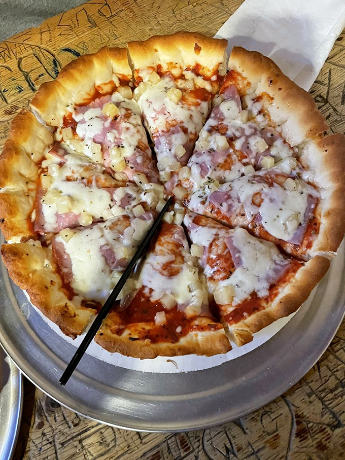 Aloha, deliciousness! This Hawaiian pizza is a tropical getaway for your mouth, no passport required.