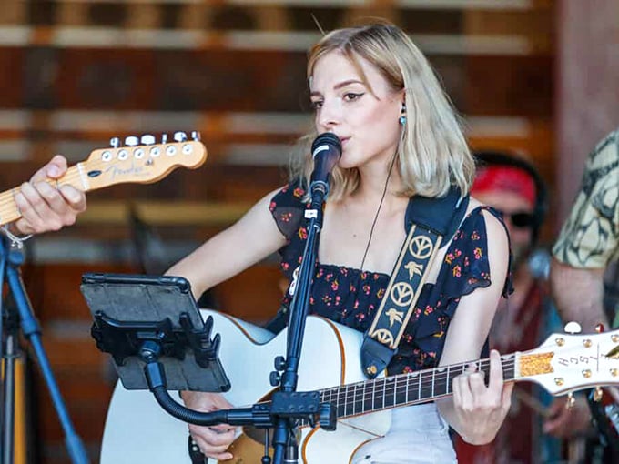 Live music in Jerome: Where notes float on mountain air. It's like Coachella, if Coachella had better views and fewer flower crowns.