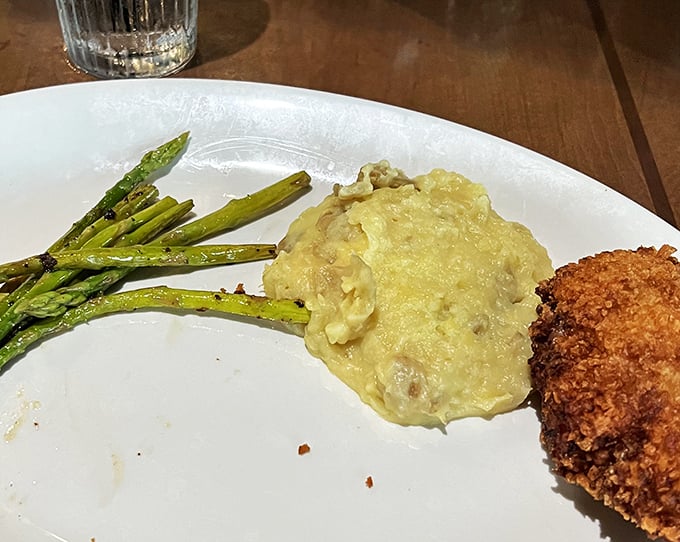 Asparagus standing at attention next to the star of the show&mdash;mashed potatoes that make grandma's recipe seem like amateur hour.
