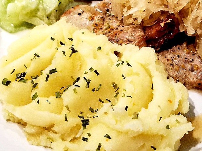 These mashed potatoes aren't just whipped&mdash;they're serenaded into submission. The perfect golden pool of butter creates a lake you'd happily swim in.