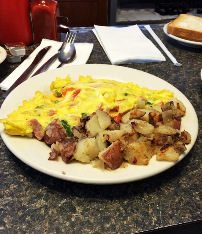 Behold, the omelet of champions! This golden masterpiece is proof that sometimes, the simplest things in life are the most satisfying.