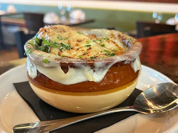 Warning: This French onion soup may cause involuntary sighs of contentment. Proceed with caution (and extra napkins for that glorious cheese pull).