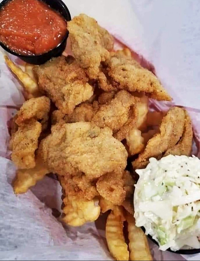 Crispy, golden, and utterly irresistible! This oyster basket is like a treasure chest from the sea, each bite a pearl of deliciousness.