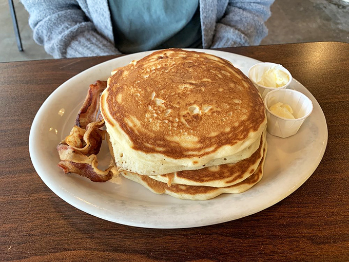 Pancakes stacked higher than your weekend to-do list. These fluffy discs of joy are here to make your Monday feel like a Saturday.