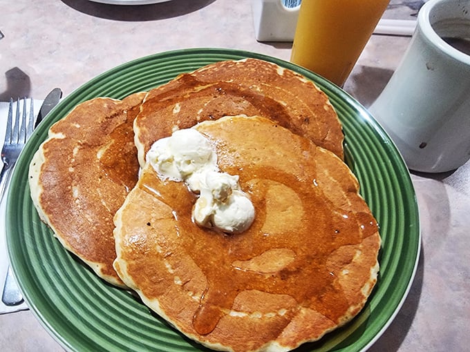 Pancakes so fluffy, they might float away if not for that generous pat of butter. Syrup application strongly encouraged.