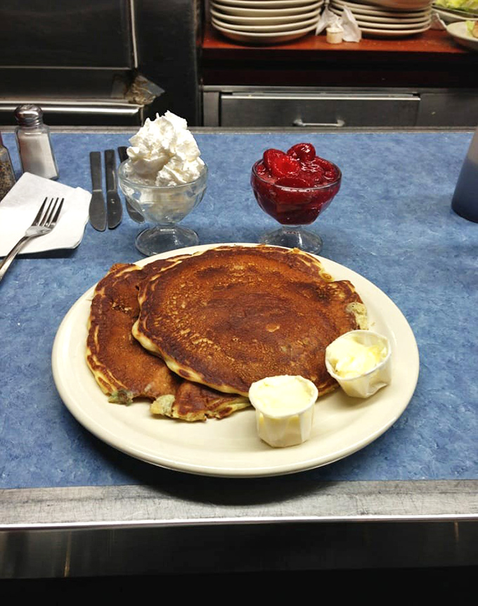 Pancakes so fluffy, they might float away if not for that pat of butter keeping them grounded. Maple syrup, anyone?