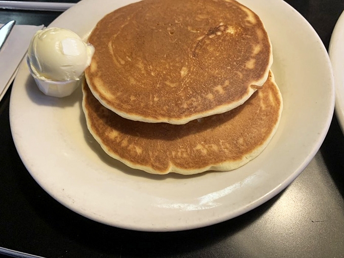 Pancakes so perfectly golden they make you wonder if they hired a professional tanning consultant.